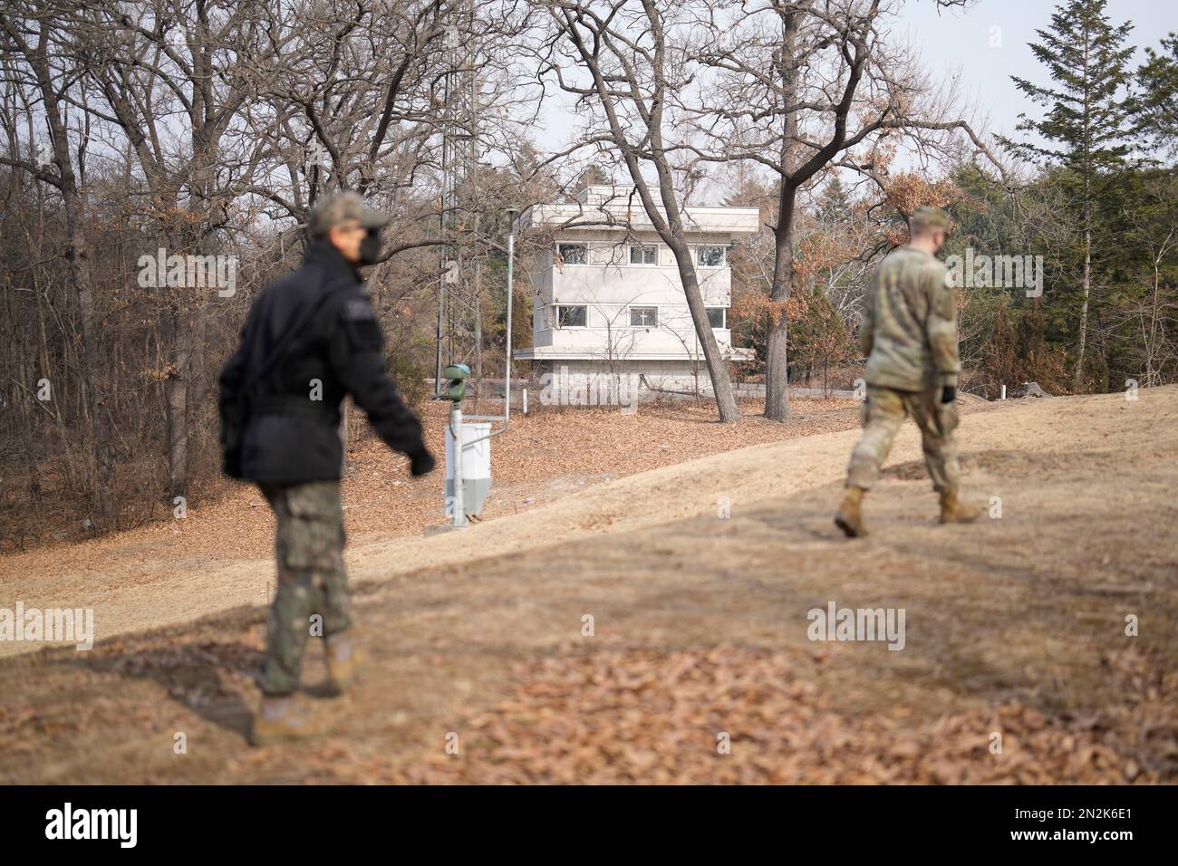 A South Korean soldier and U.S. soldier walk near a North Korea's ...
