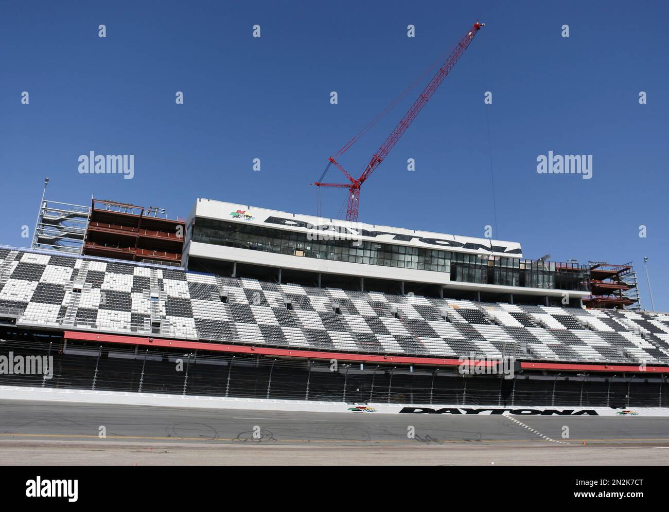 Workers remove sections of the Sprint Tower and grandstands at Daytona ...