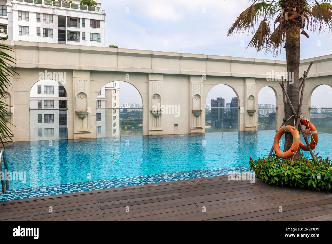 A rooftop swimming pool on top of an apartment block in Ho Chi Minh ...