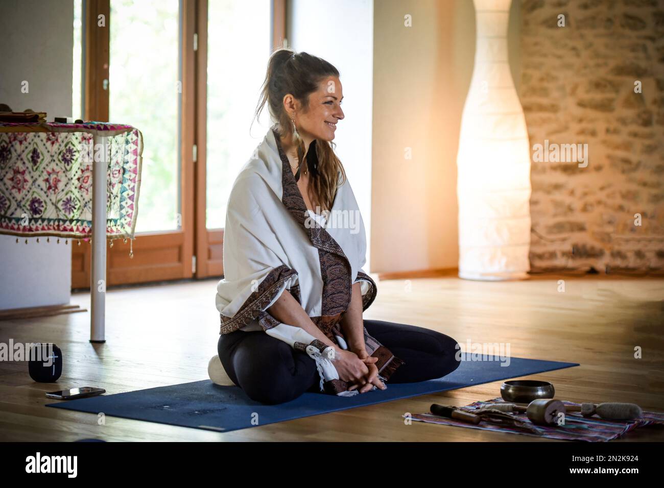 yoga coach during a group session at a retreat Stock Photo - Alamy
