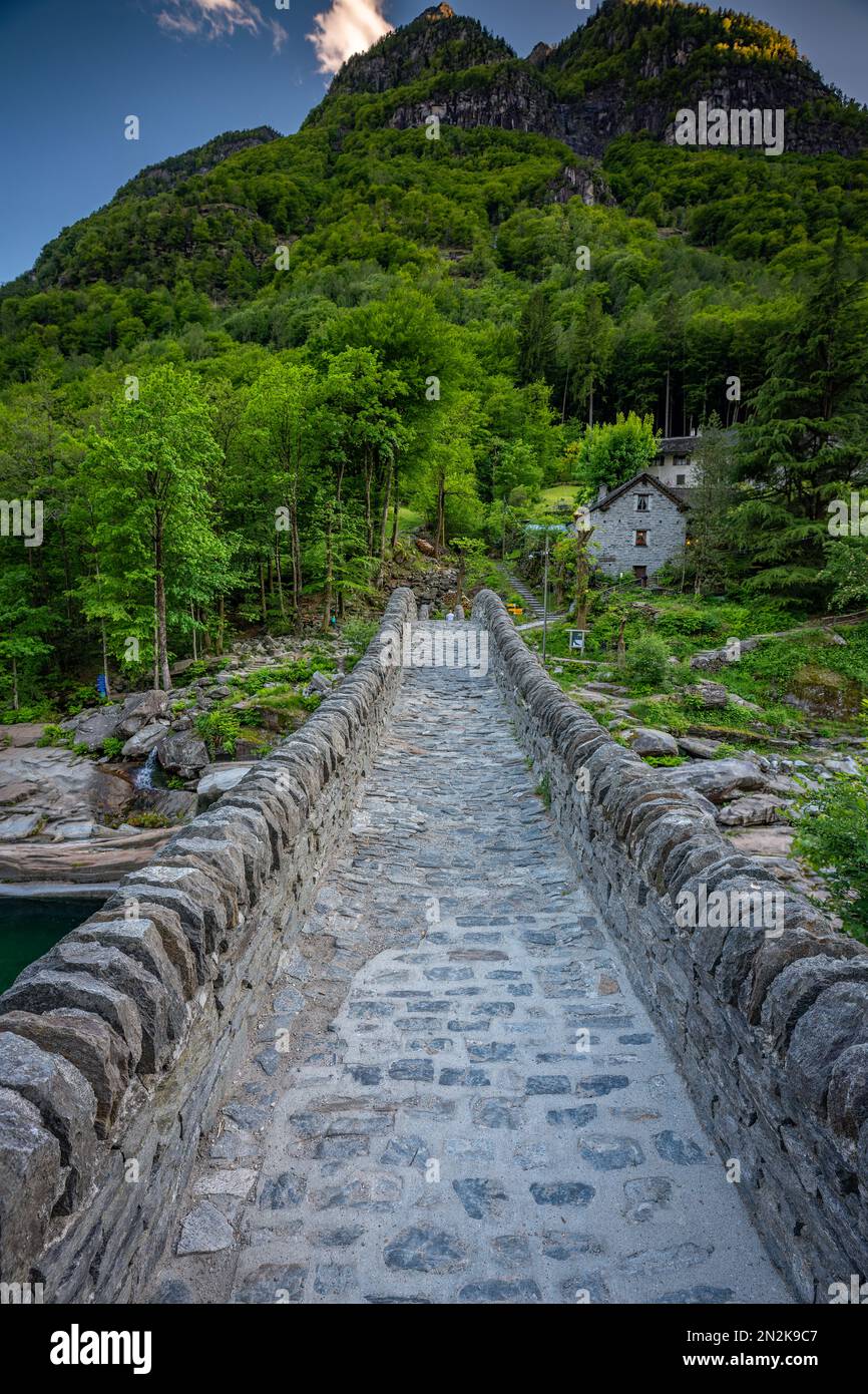 An old stone bridge that stands over a stream Stock Photo - Alamy