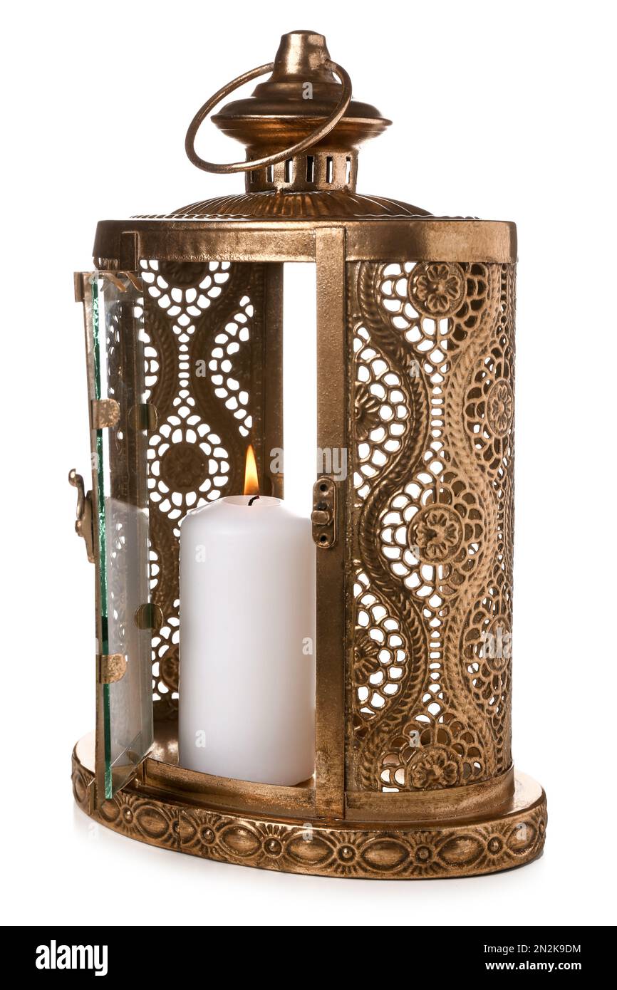 Muslim lantern with burning candle for Ramadan on white background ...