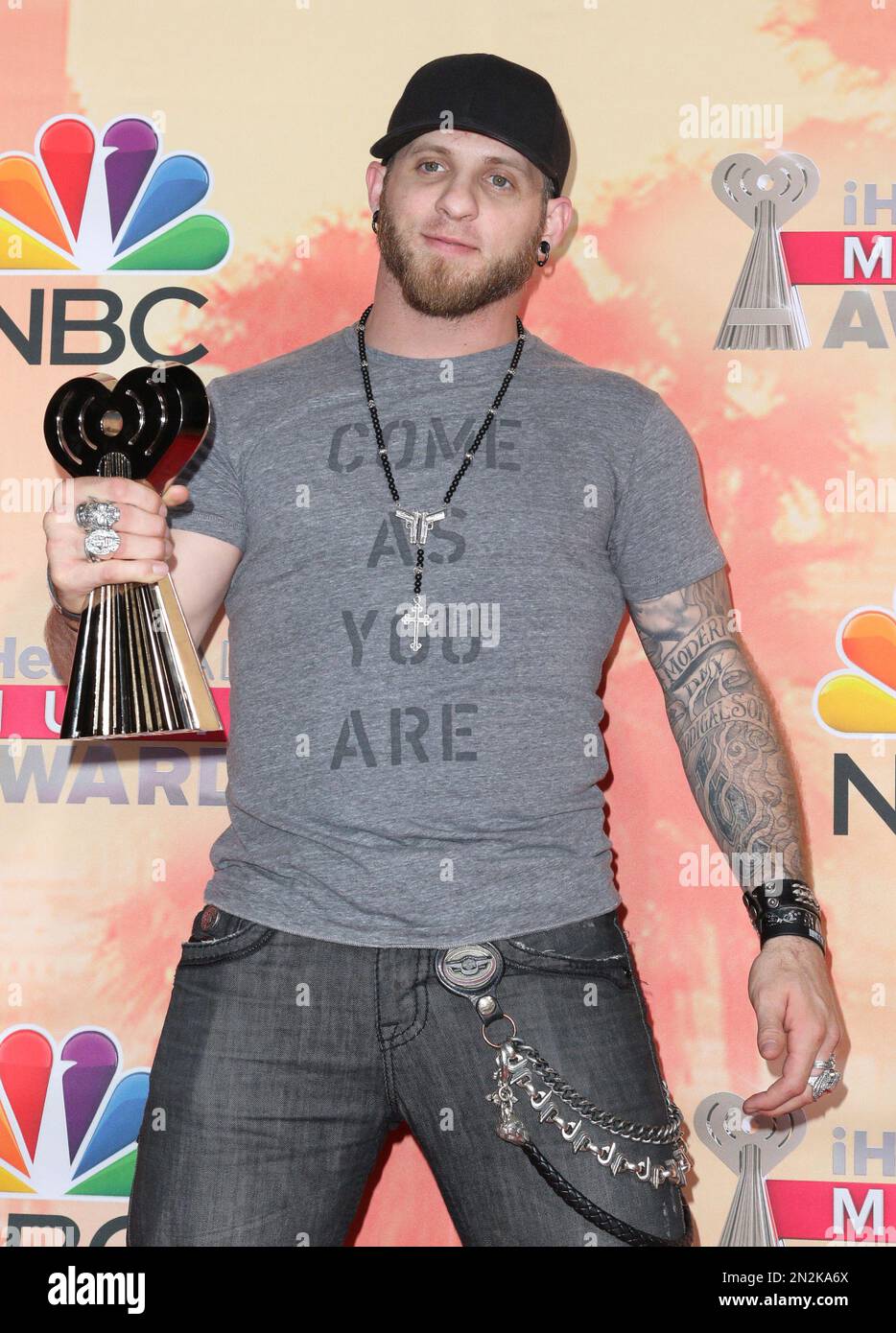 Brantley Gilbert poses in the press room with the renegade award at the ...