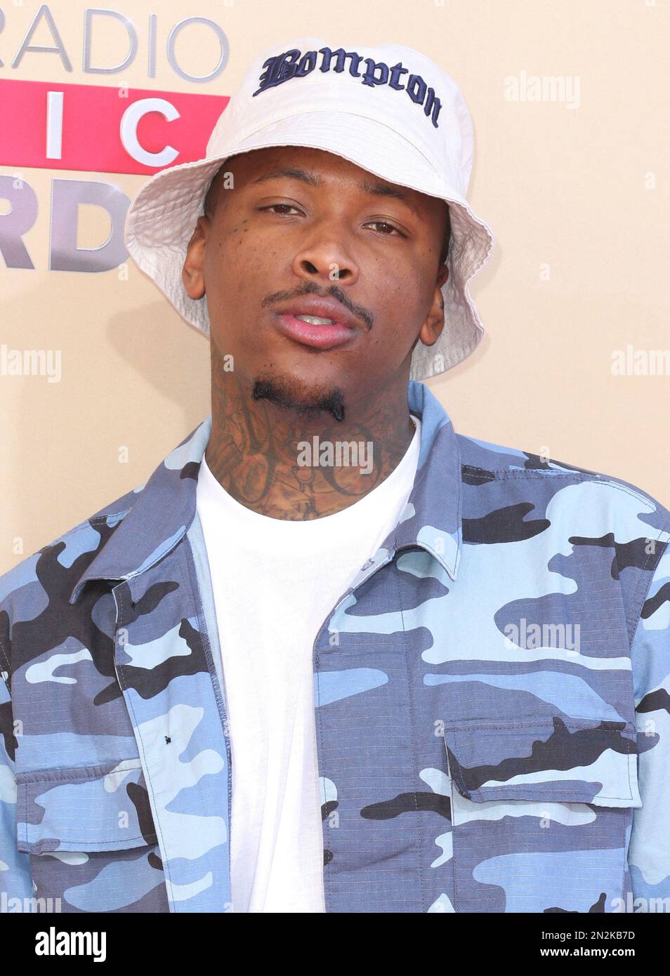 YG arrives at the iHeartRadio Music Awards at The Shrine Auditorium on ...