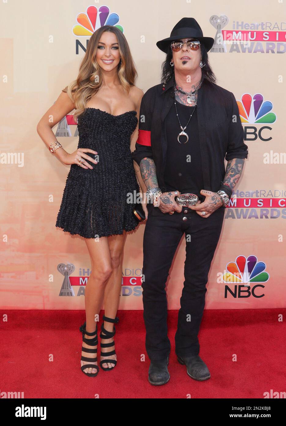 Niki Sixx, right, and Courtney Bingham arrive at the iHeartRadio Music ...