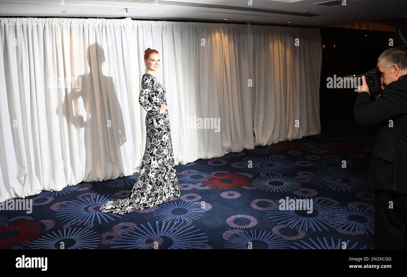 Jessica Chastain poses for photographers upon arrival for the 20th ...
