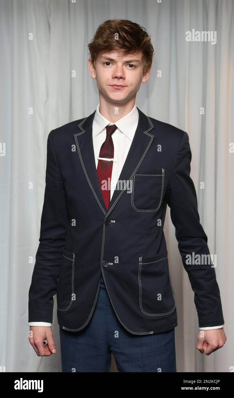 Thomas Brodie-Sangster poses for photographers upon arrival for the ...