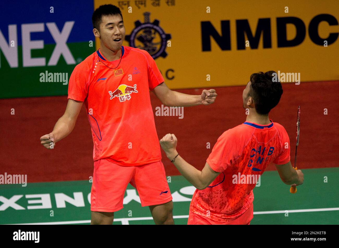 China's Hong Wei, left and Chai Biao celebrate after winning the men's ...