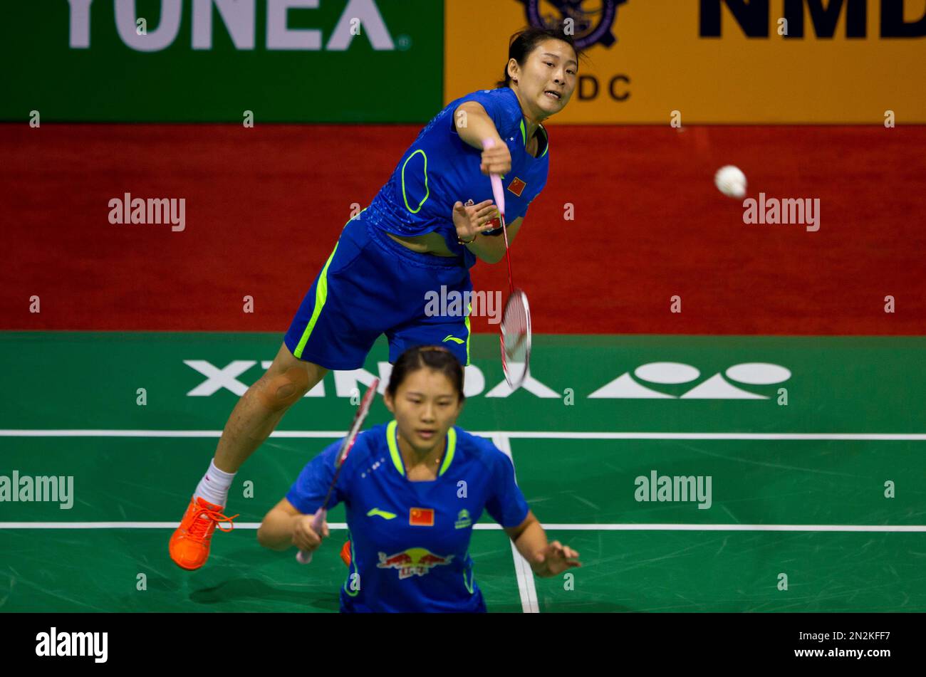 China's Ying Luo smashes as Yu Luo watches while they play against ...
