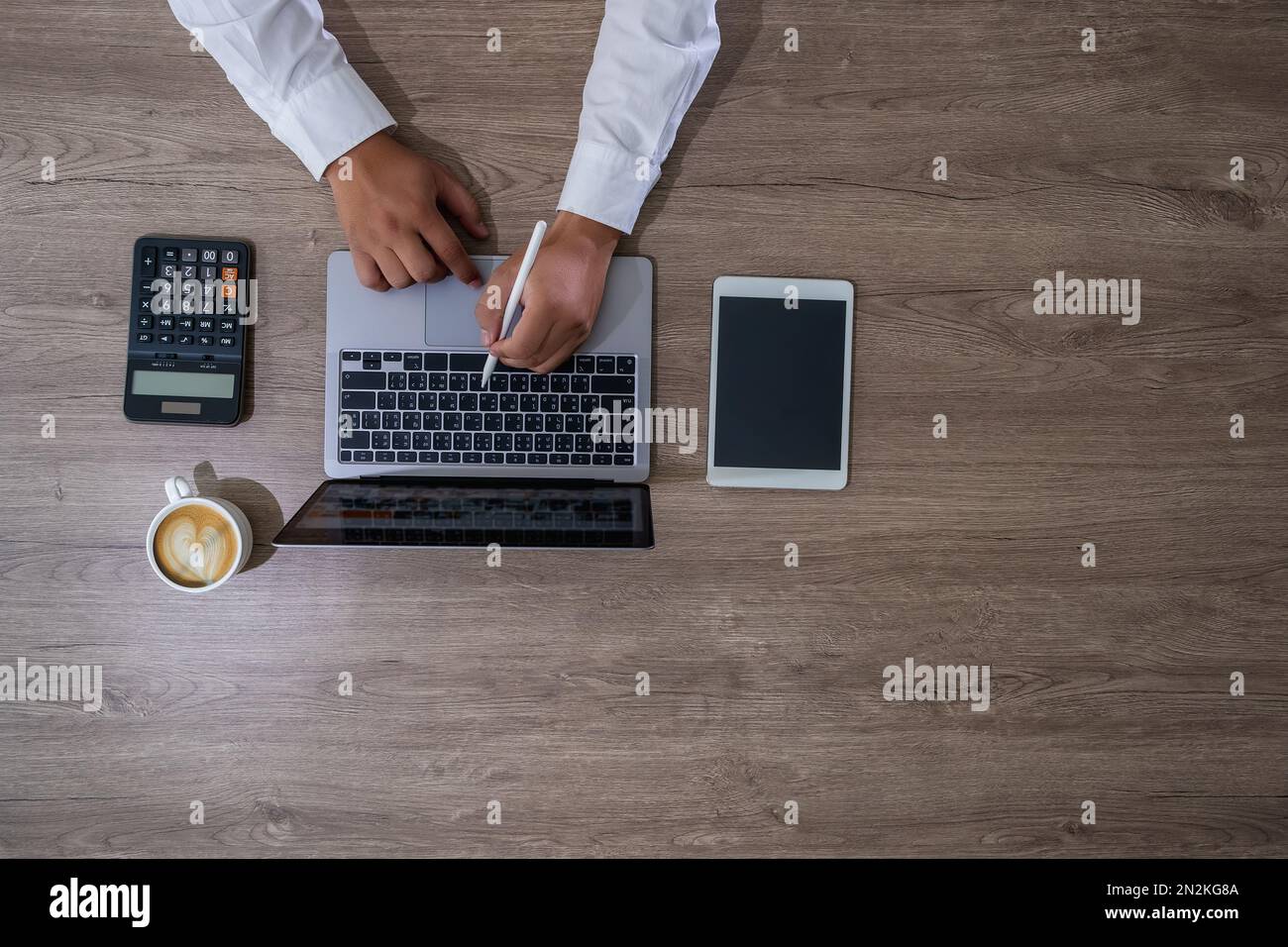 businessman using a calculator top view, calculating user expenses ...