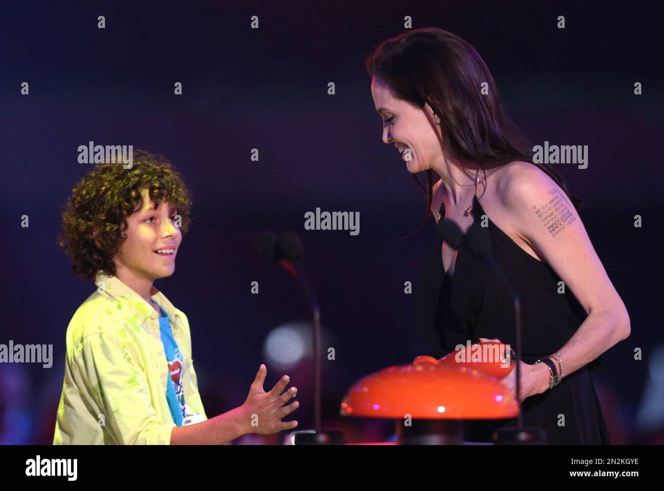 Angelina Jolie accepts the award for favorite villain for “Maleficent ...