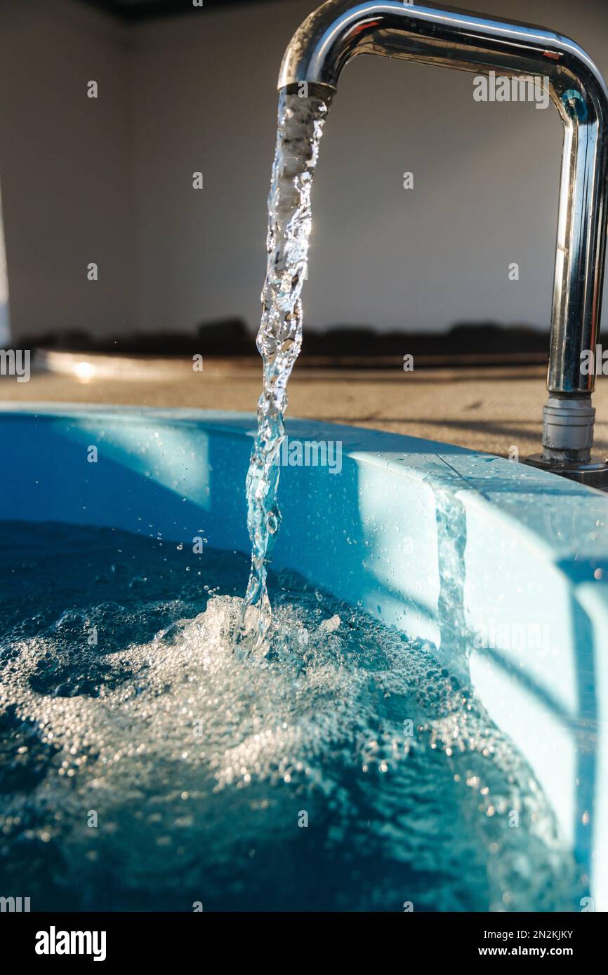 Little plunge pool with cold water preparing after relaxing in hot tube ...