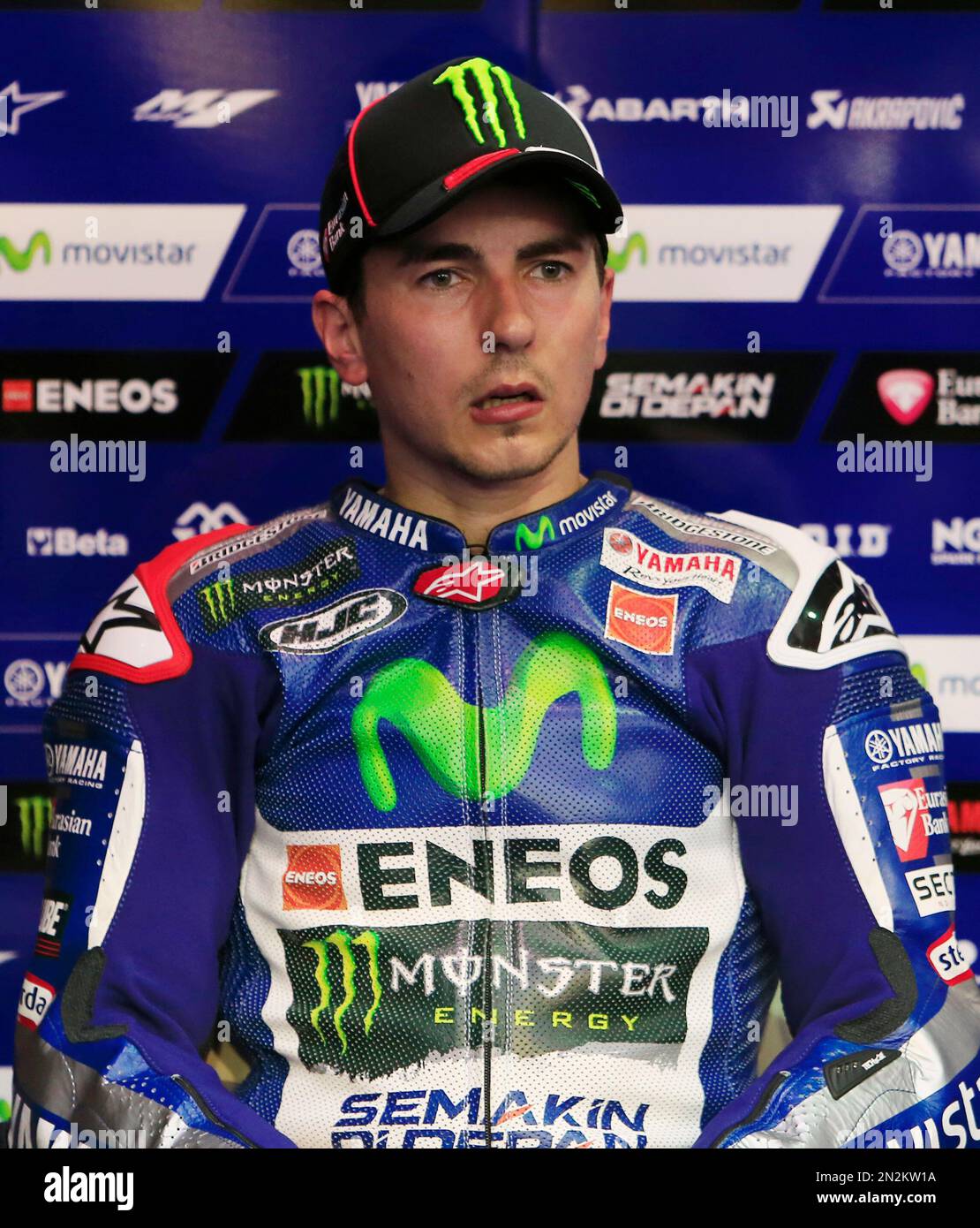 Spanish MotoGP rider Jorge Lorenzo looks on in the pit box during a ...