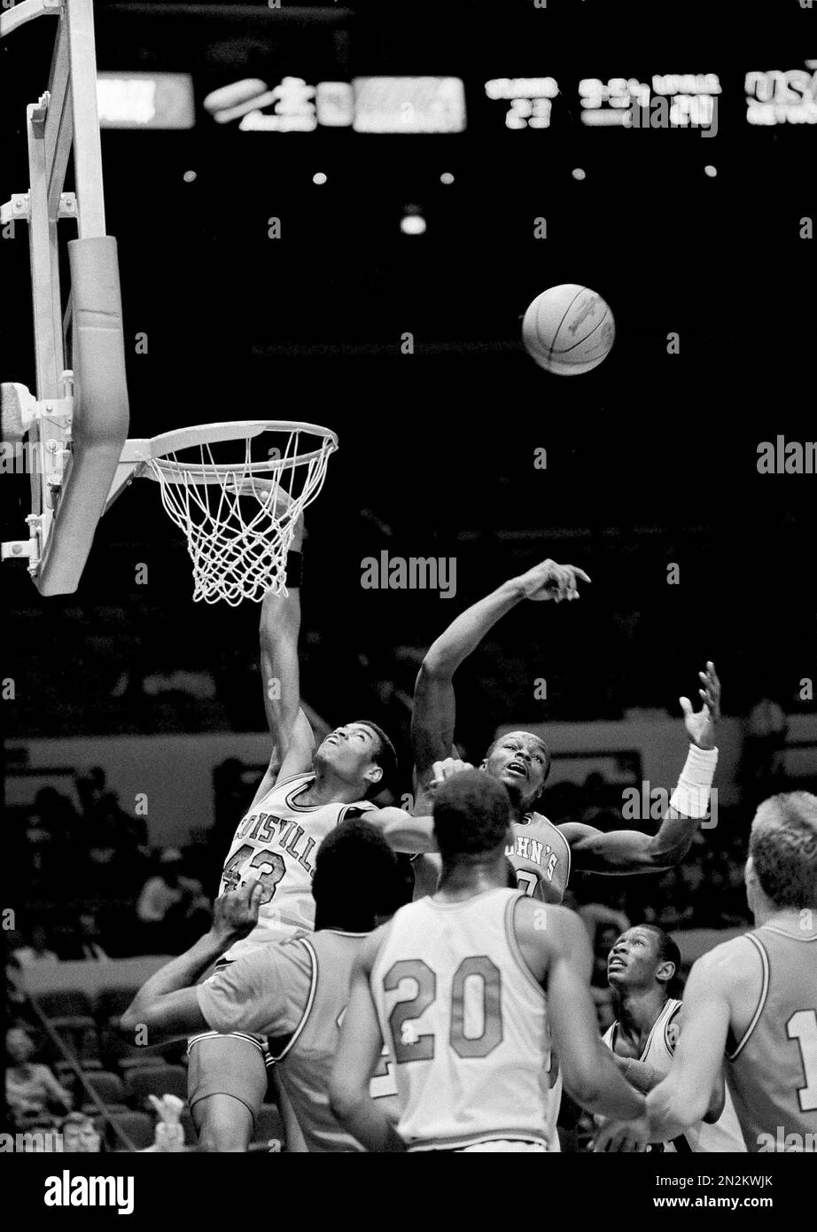 Willie Glass (30) of St. John's University battles for position with ...