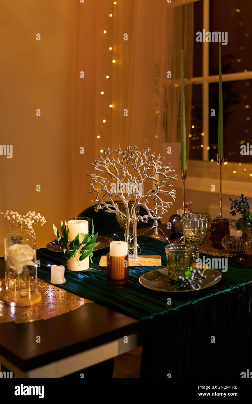 Romantic dinner table setting for couple with festive lights, Table for ...