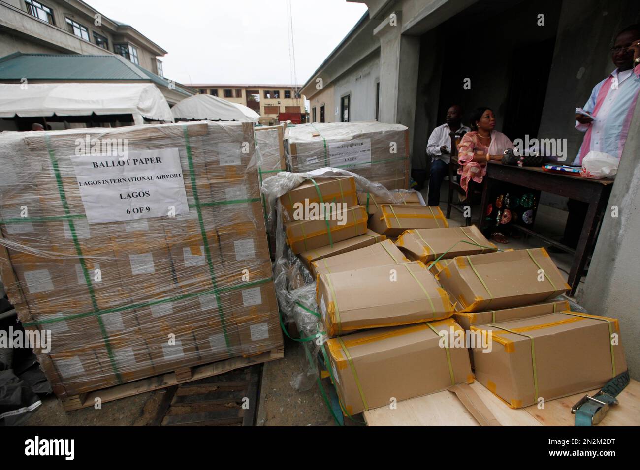 Electoral officials wait for the distribution of presidential election ...