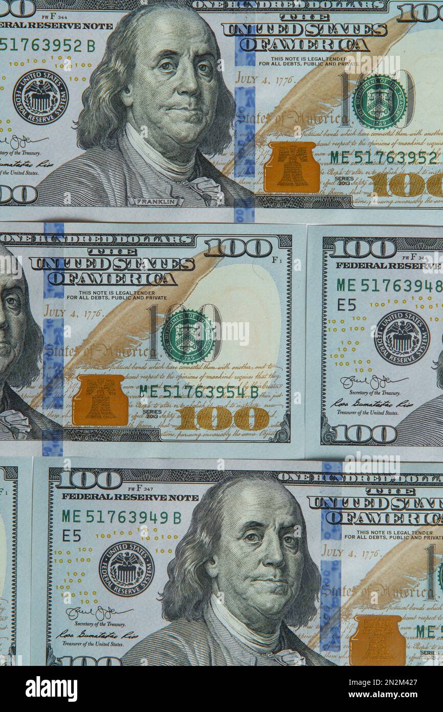 Top view of several one hundred 100 dollars banknotes bills greenbacks ...