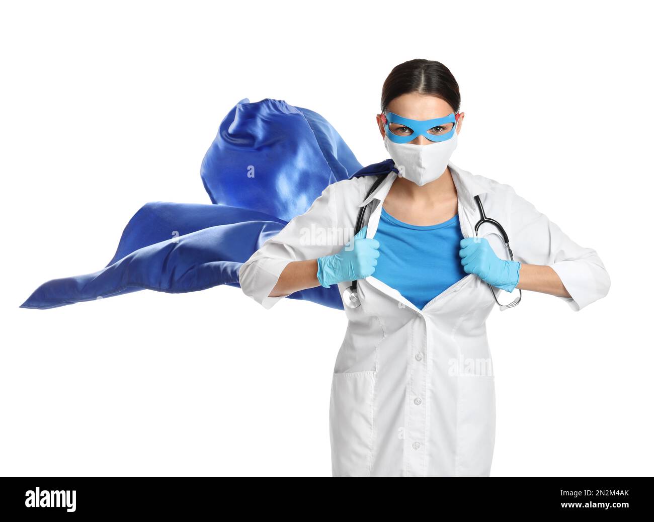 Doctor dressed as superhero posing on white background. Concept of ...