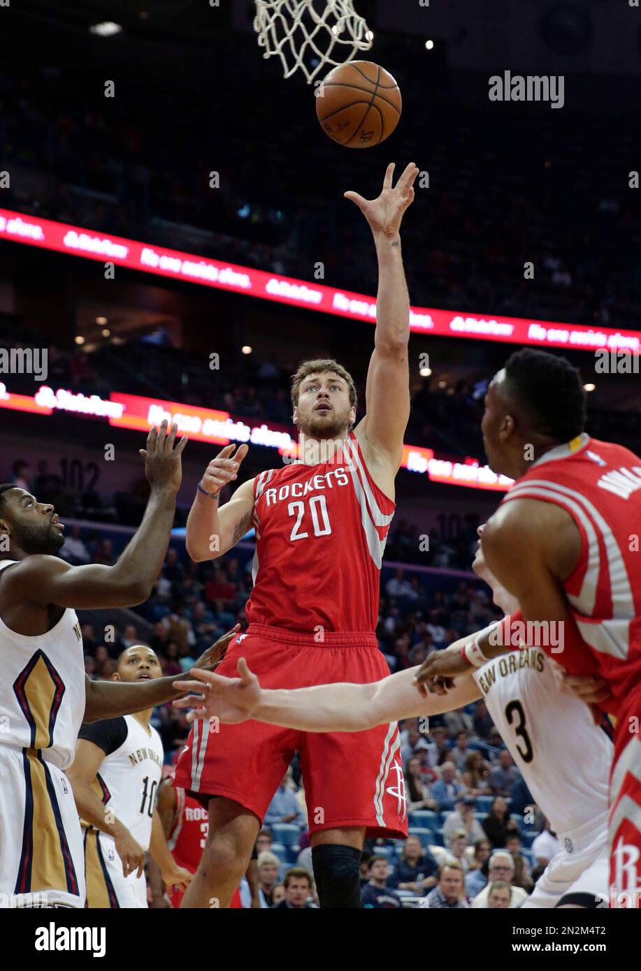 Houston Rockets forward Donatas Motiejunas (20) goes to the basket in ...