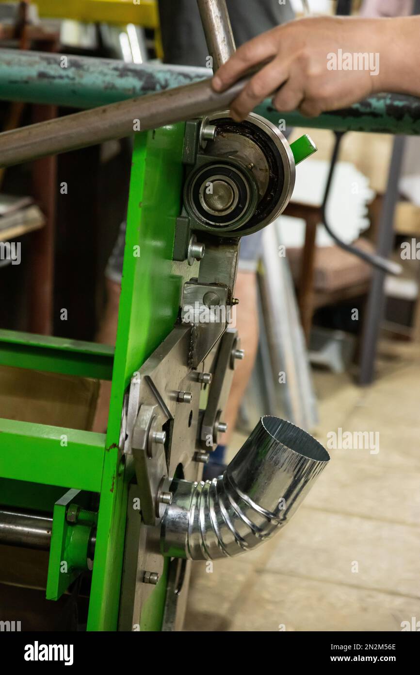 the machine for production of products from a plate during work Stock ...