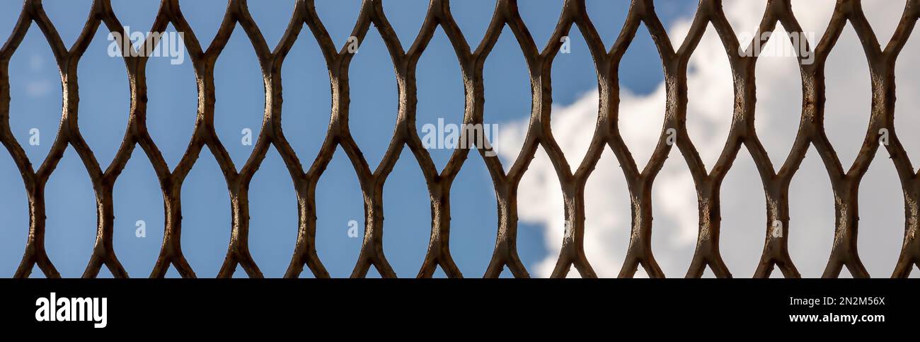 texture of the sky through a metal lattice Stock Photo - Alamy