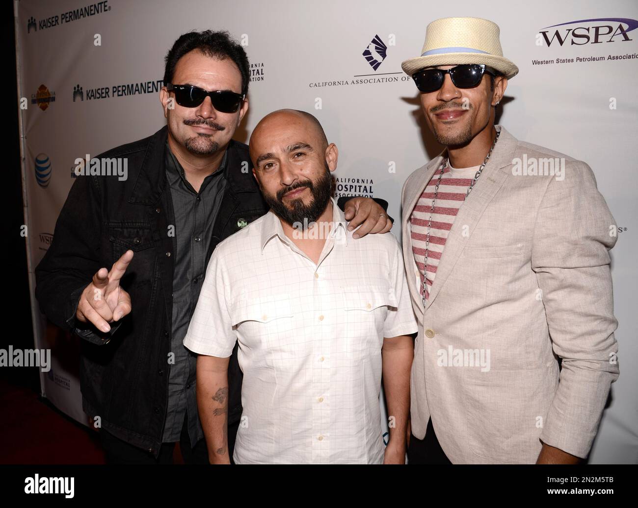 Ulises Bella, and from left, Raul Pacheco, and Justin Poree of the ...