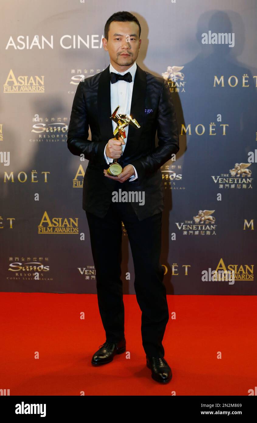 Chinese actor Liao Fan poses after winning the Best Actor award for his ...