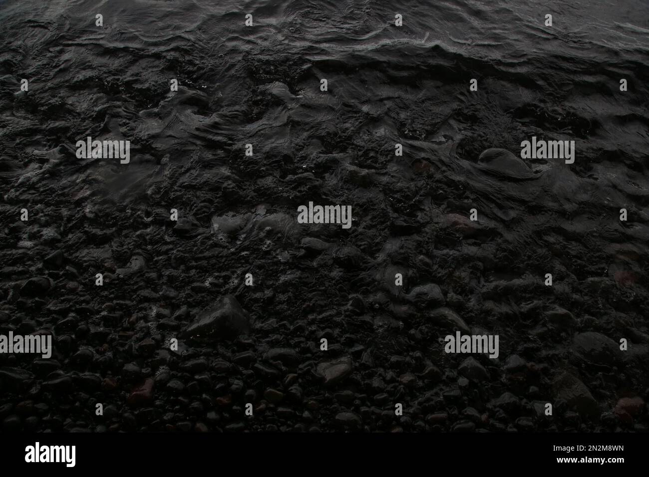Rippling dark water surface background Stock Photo - Alamy