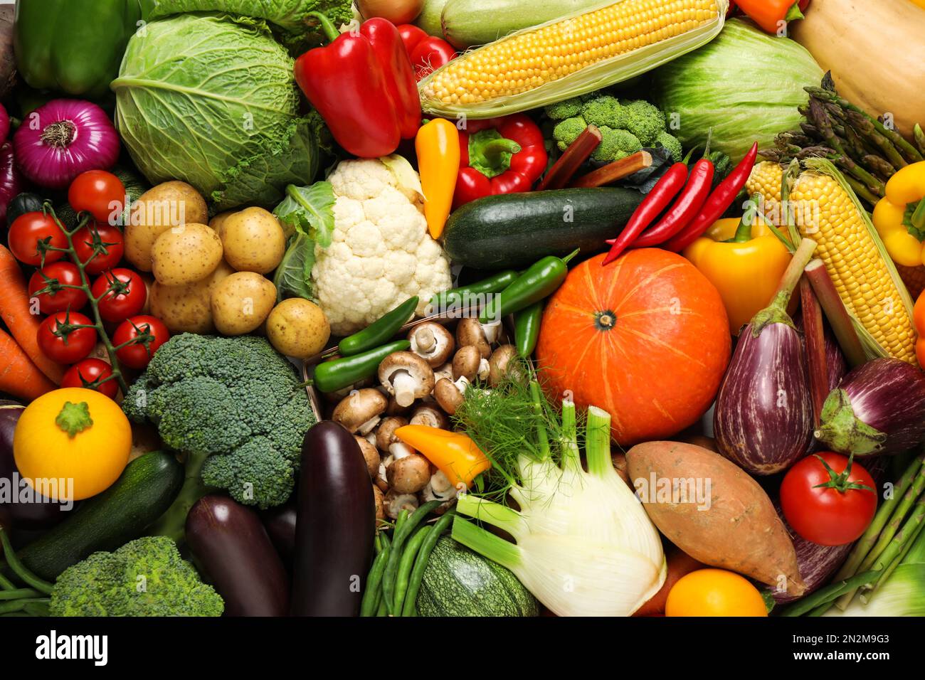 Different fresh vegetables as background, closeup view Stock Photo - Alamy