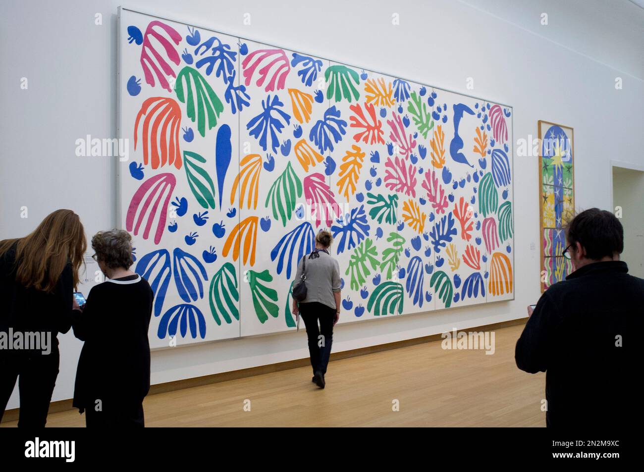 People look at the monumental paper cut-out The Parakeet and the ...