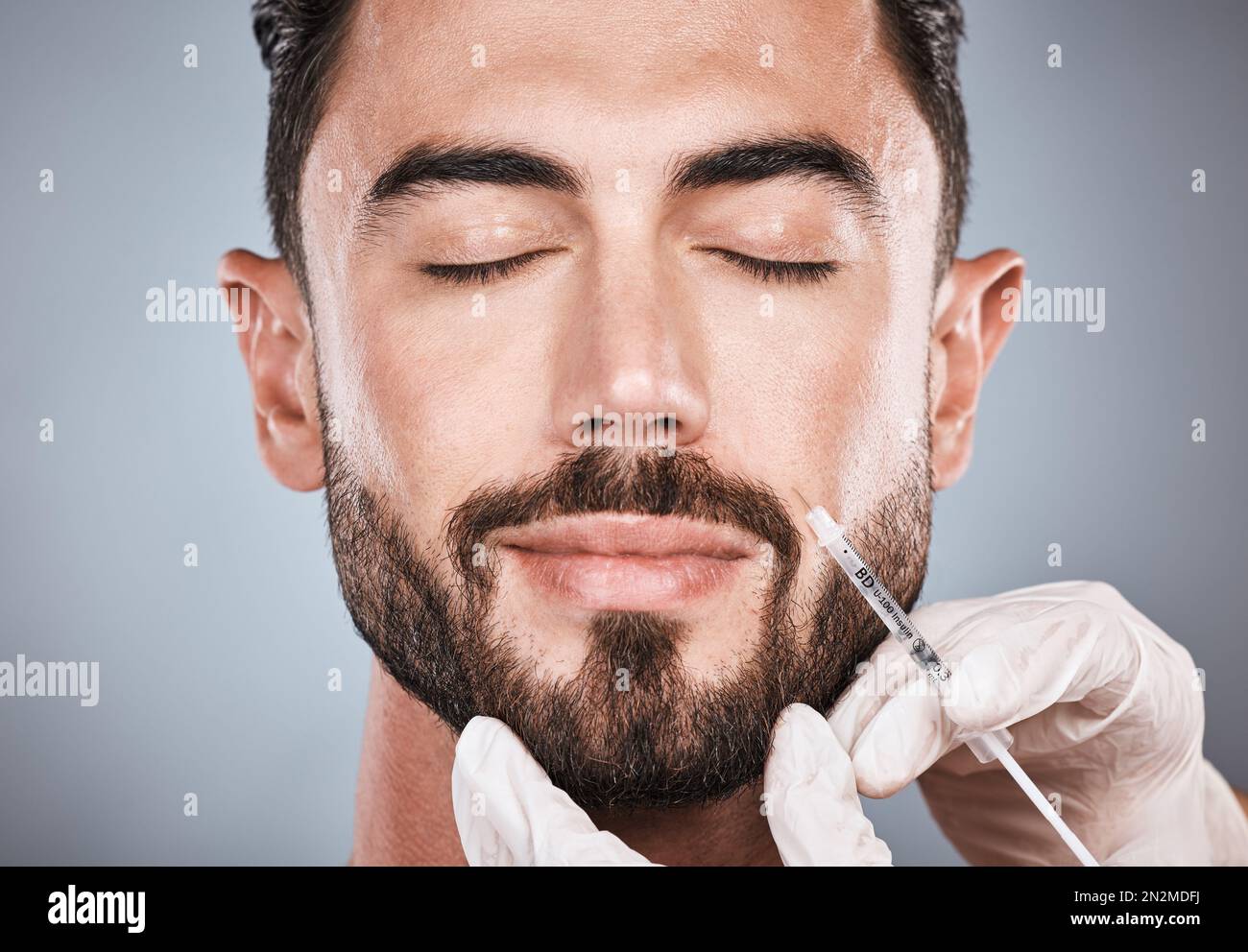 Needle, man and plastic surgery for skincare, collagen and beauty ...