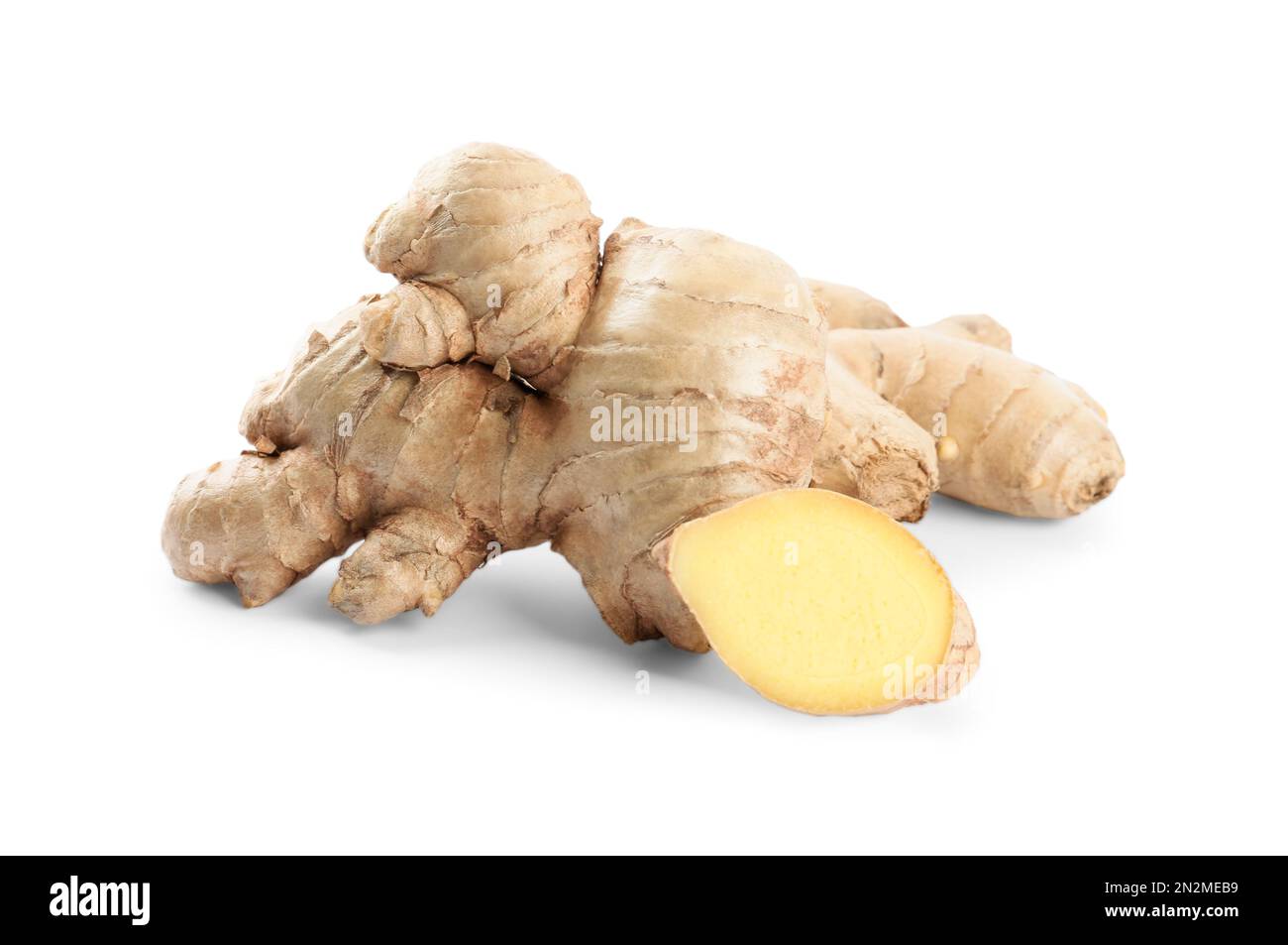 Whole and cut fresh ginger isolated on white Stock Photo - Alamy