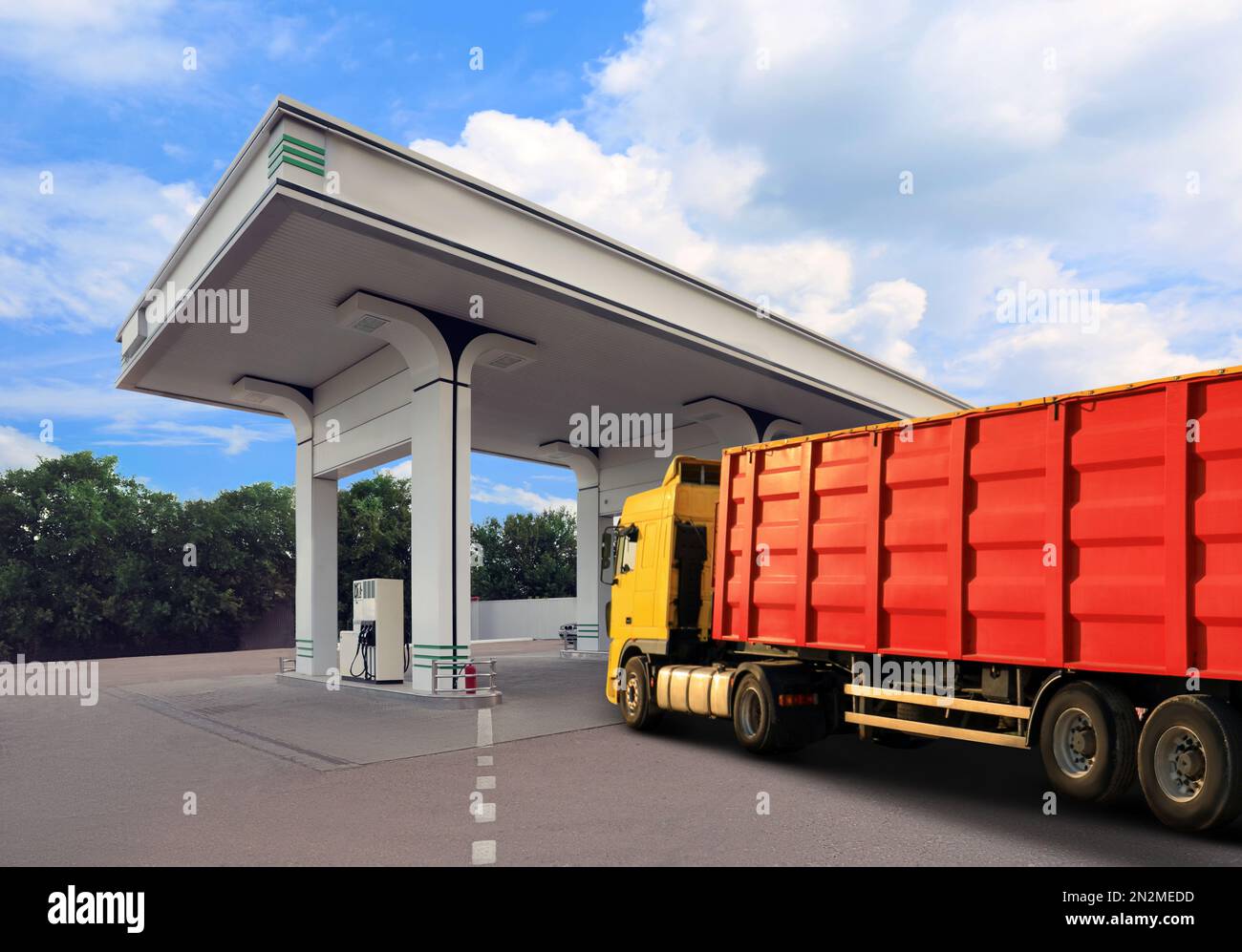 Bright truck driving to modern gas filling station Stock Photo - Alamy