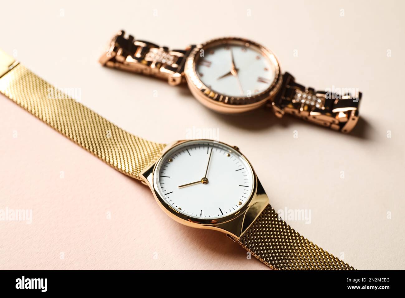 Luxury wrist watches on beige background, closeup Stock Photo - Alamy