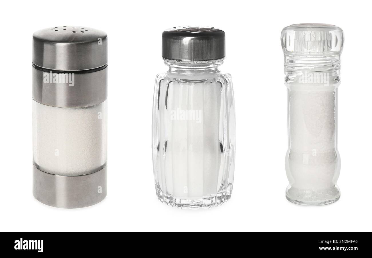 Set of shakers with salt on white background Stock Photo - Alamy