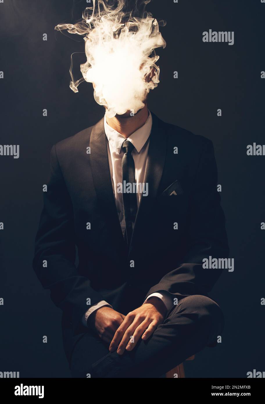 Businessman, suit and smoke in dark studio for corporate fashion, mafia ...
