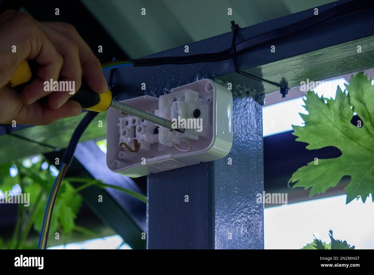 electrician to connect the outlet. selective focus Stock Photo - Alamy