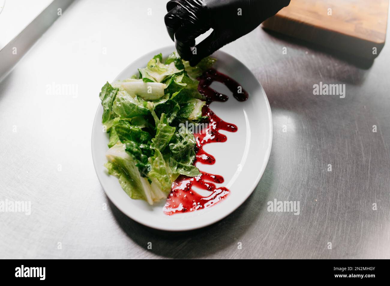 Vegetable salad cooking process. Food delivery concept. lettuce and ...