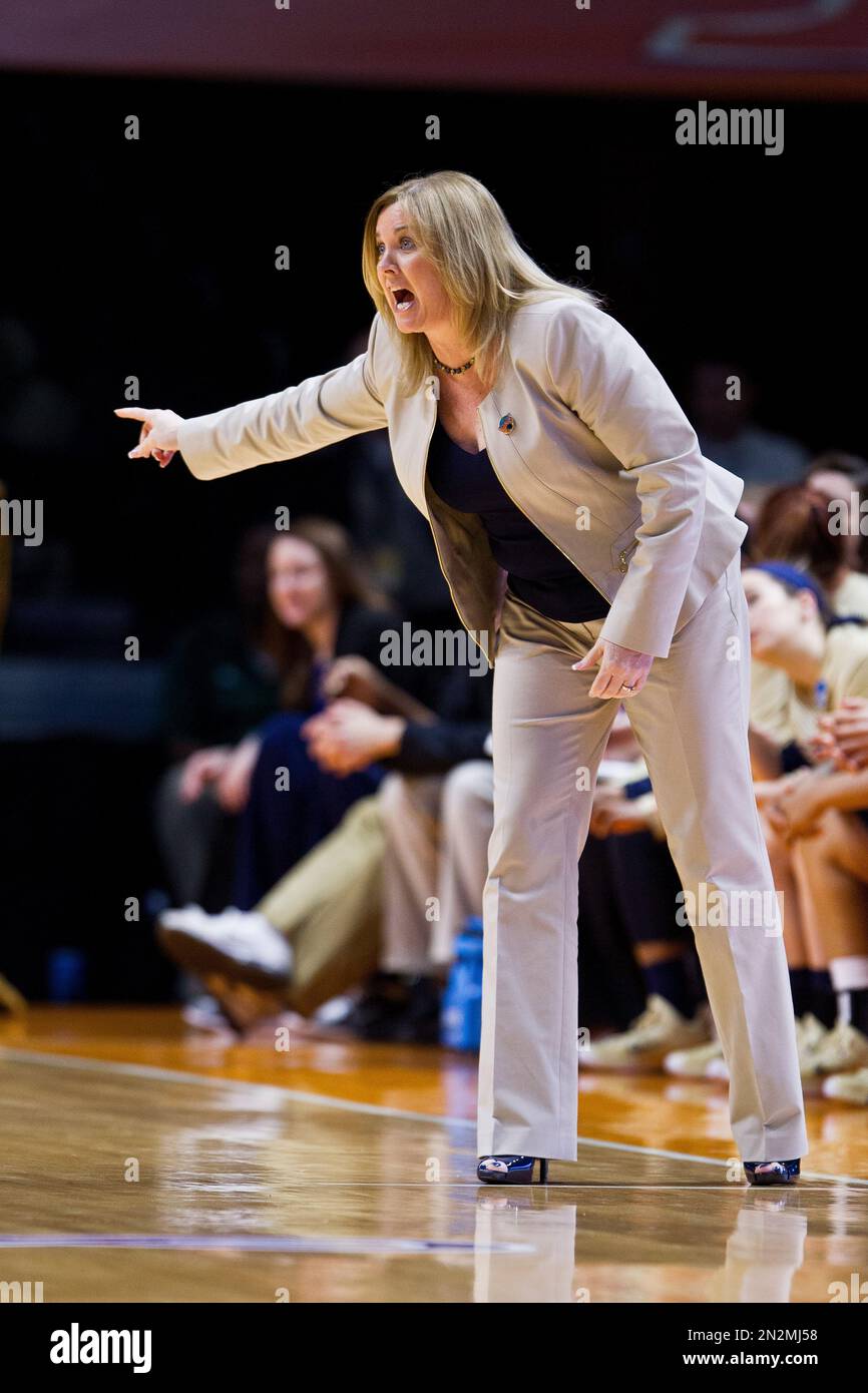 Pittsburgh head coach Suzie McConnell-Serio directs her players in the first half of a NCAA ...