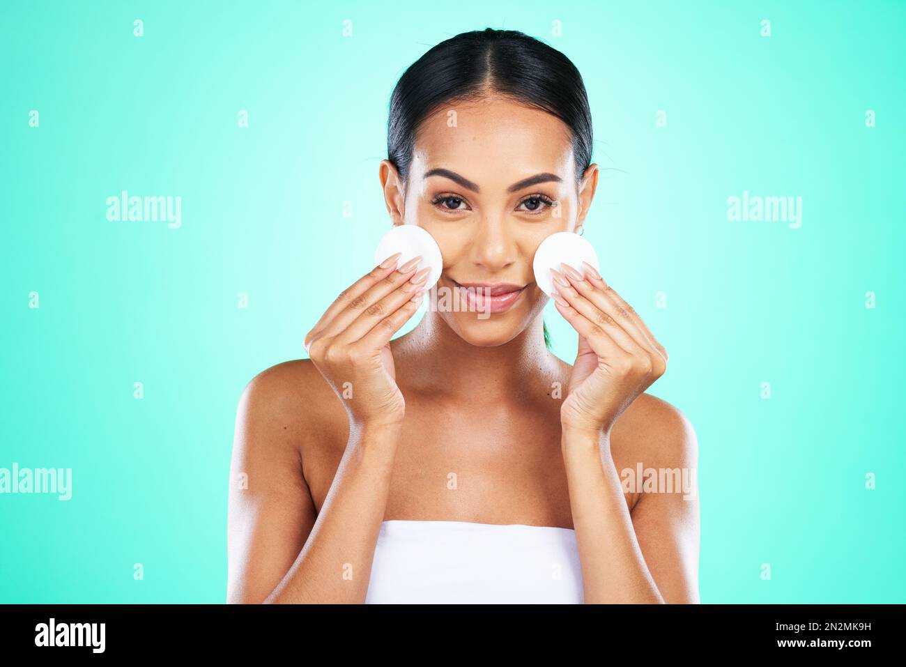 Cotton pad and black woman isolated on studio background for face or ...