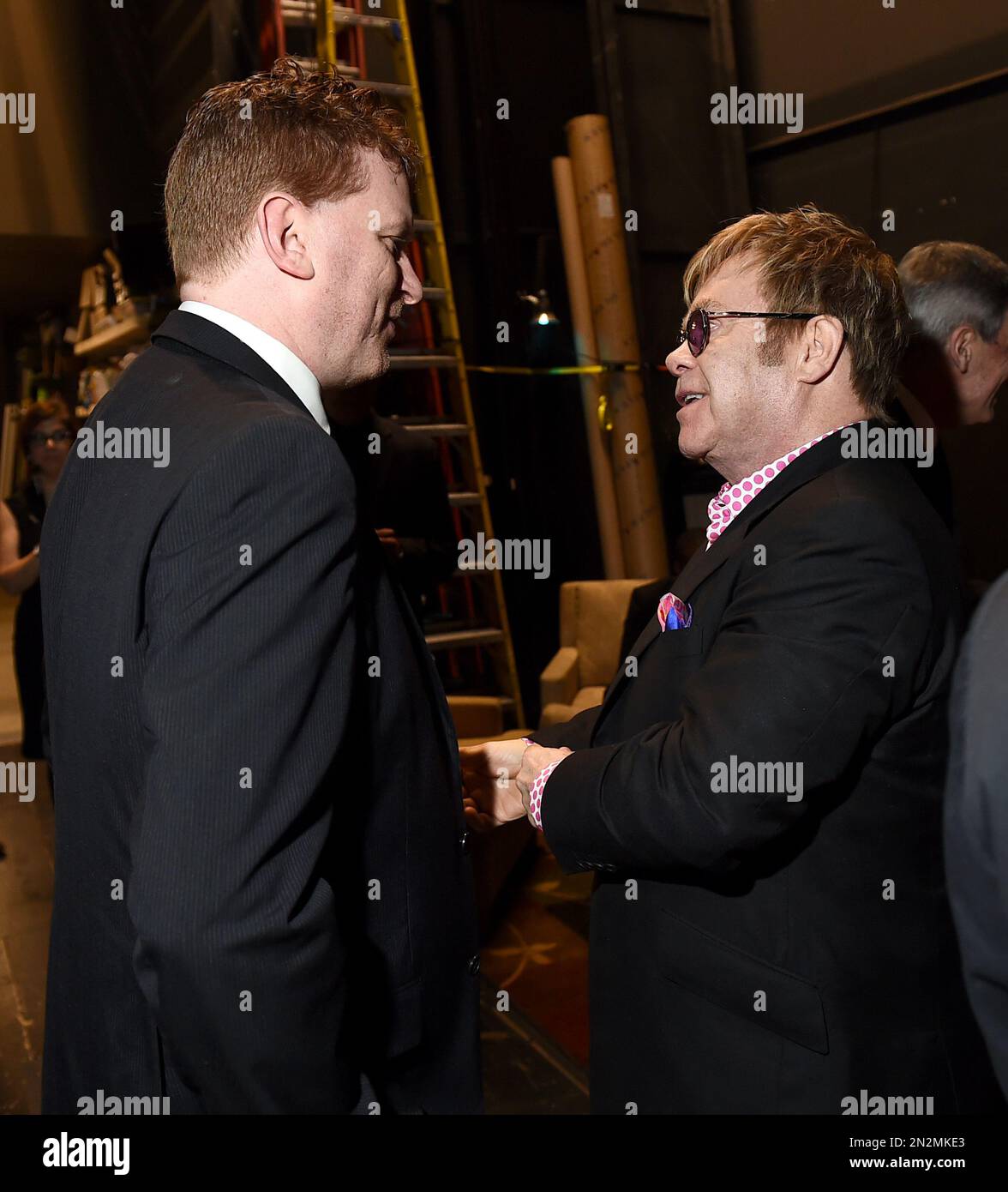 Gil Cates Jr., left, and Elton John attend Backstage at the Geffen on ...