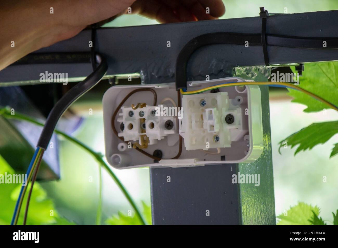 electrician to connect the outlet Stock Photo - Alamy