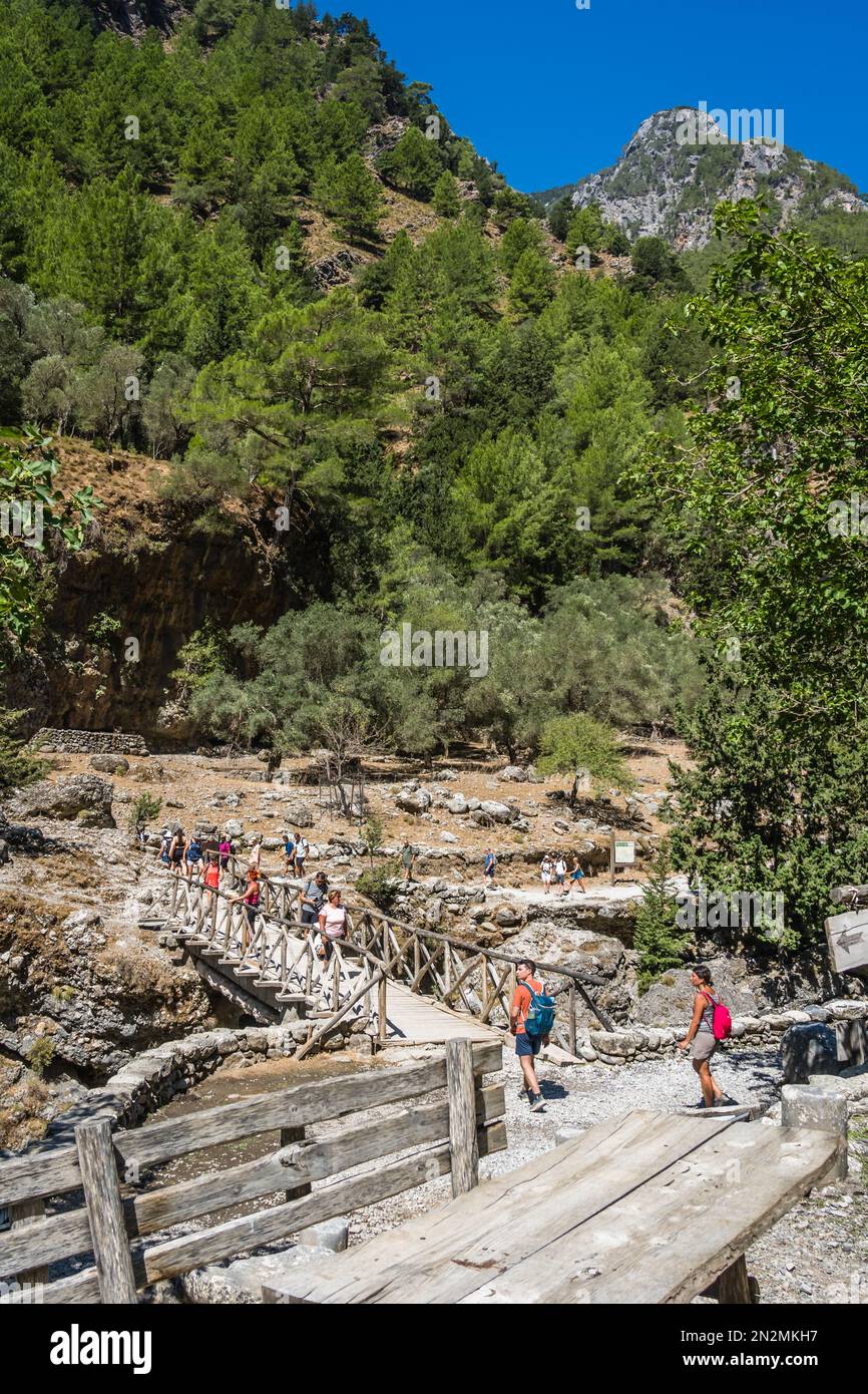 Samaria Gorge, Crete, Greece - August 2022 : People crossing wooden ...