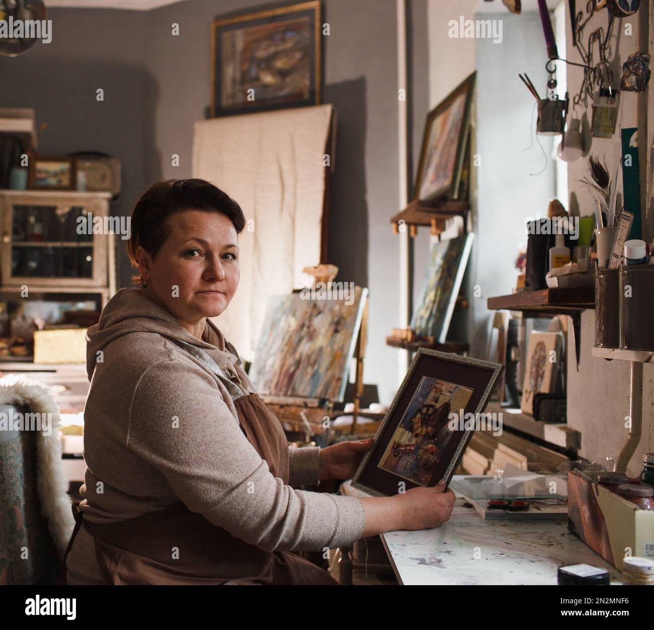 Professional female artist girl paintbrush hi-res stock photography and ...