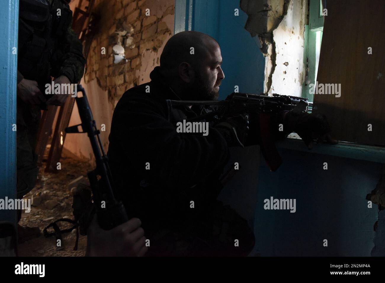 Fighters of Ukraine's "Azov" volunteer battalion take their position in ...