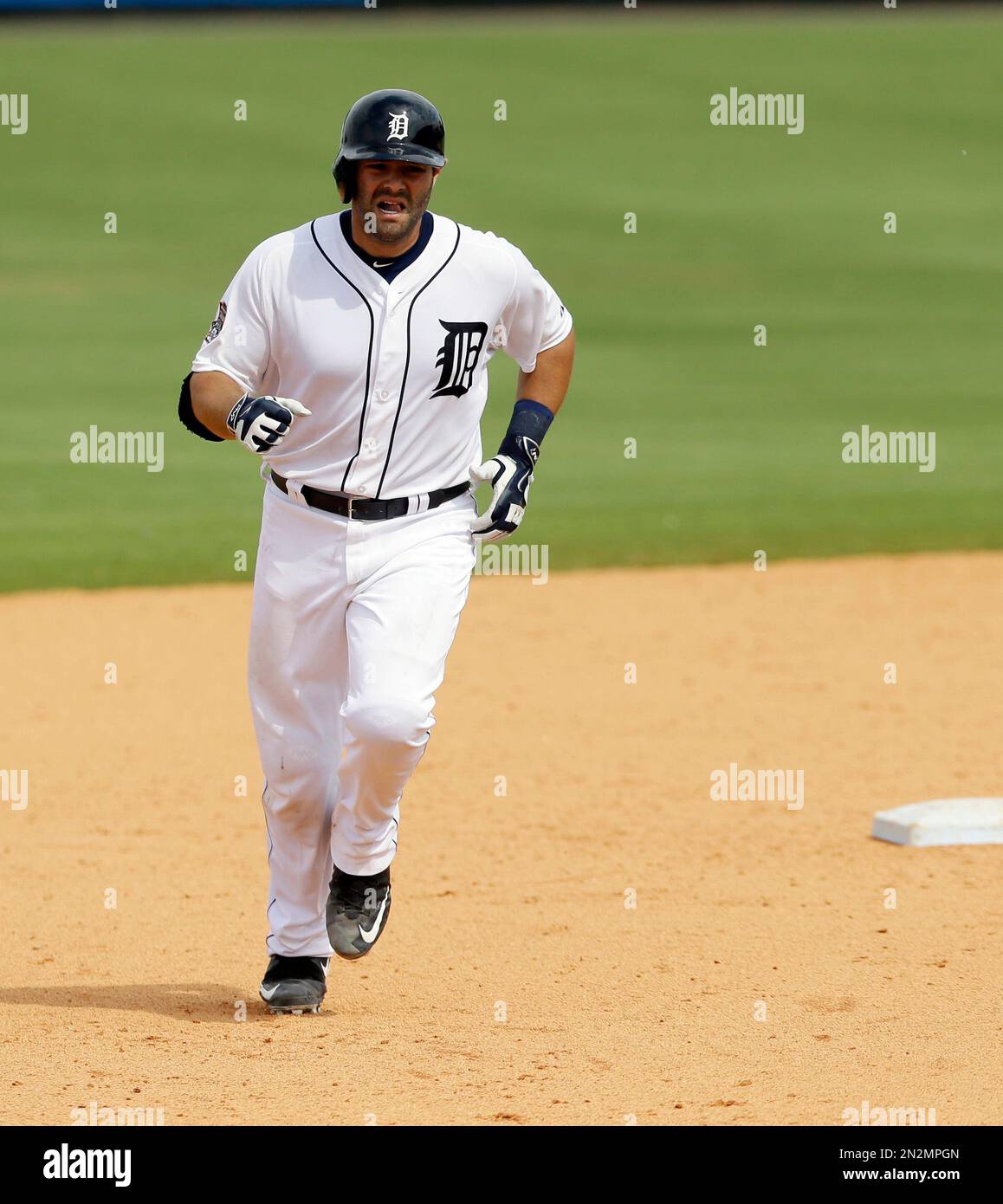 Detroit Tigers' Alex Avila rounds the bases after his two-run home run ...