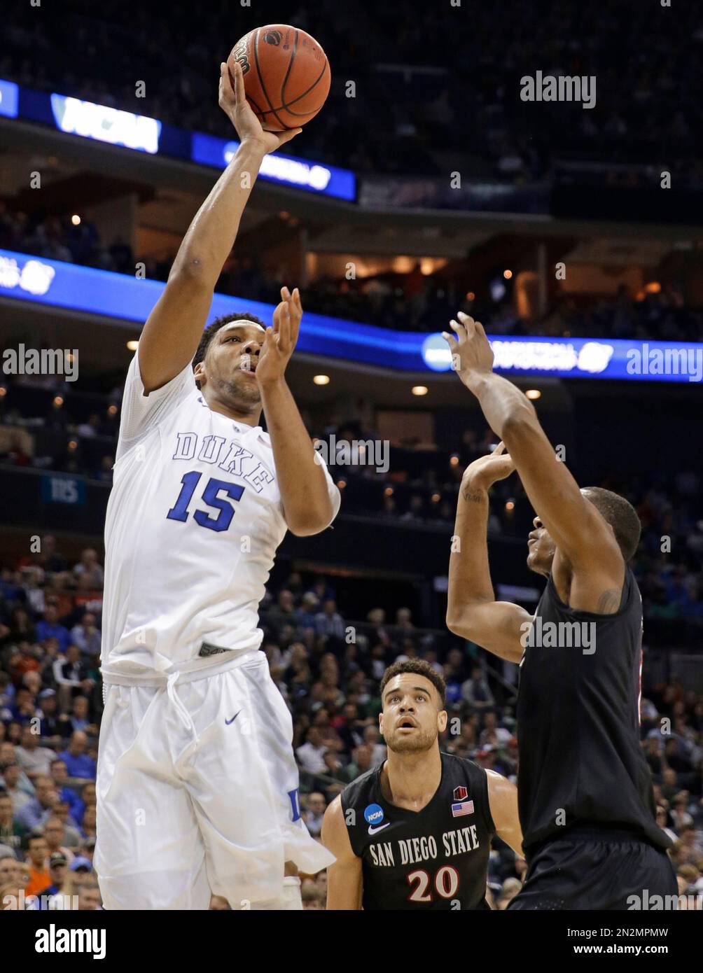 Duke's Jahlil Okafor (15) shoots over San Diego State's Skylar Spencer ...