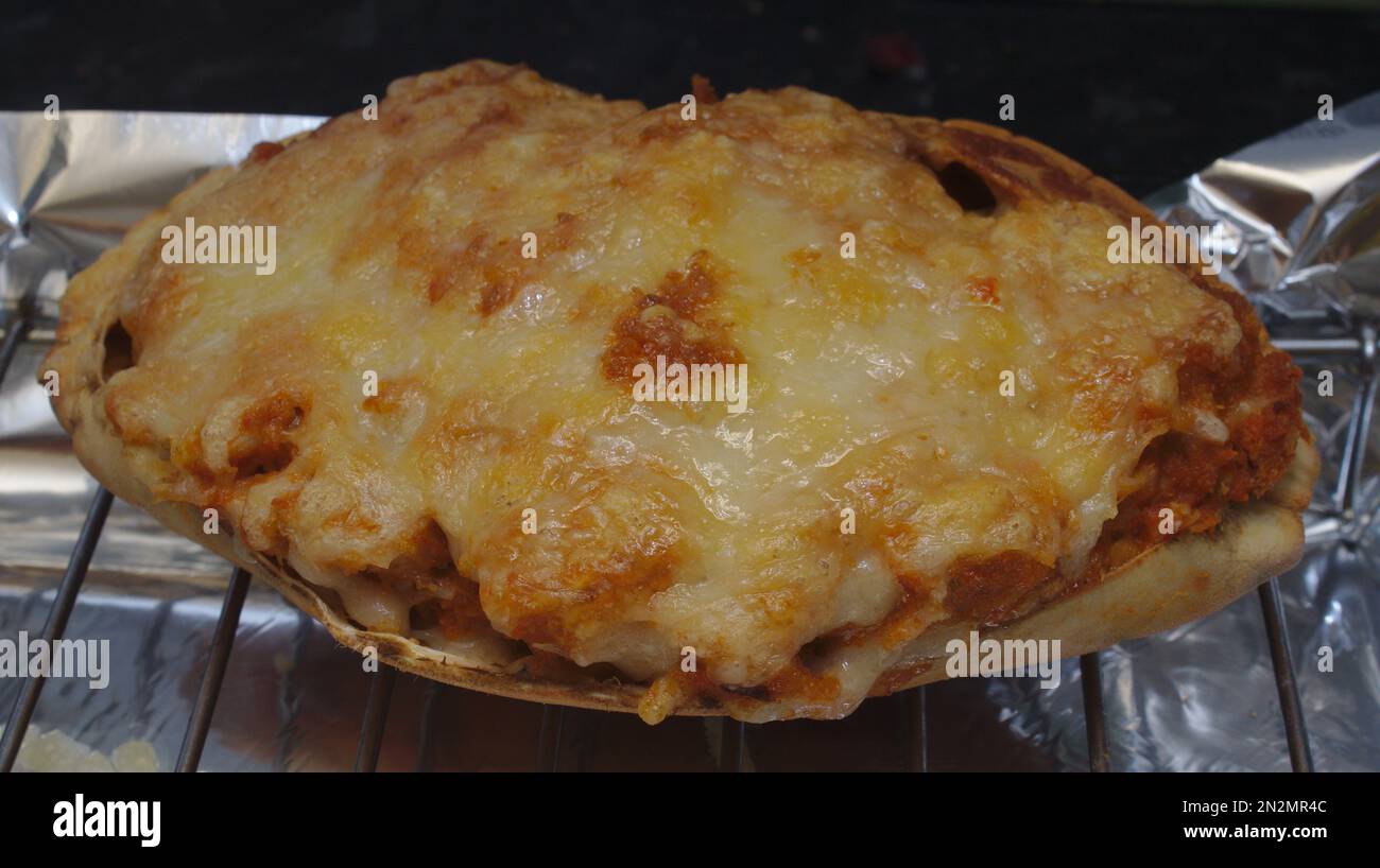 Grilled Cormer crab with cheese Stock Photo - Alamy