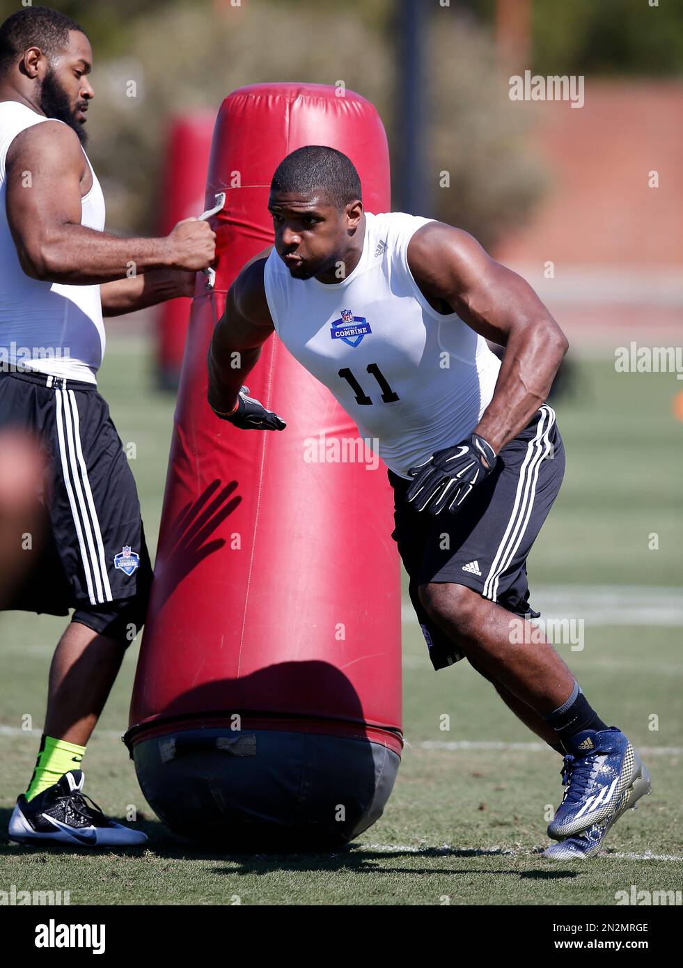 Defensive End Michael Sam, from Missouri, runs through a drill during ...