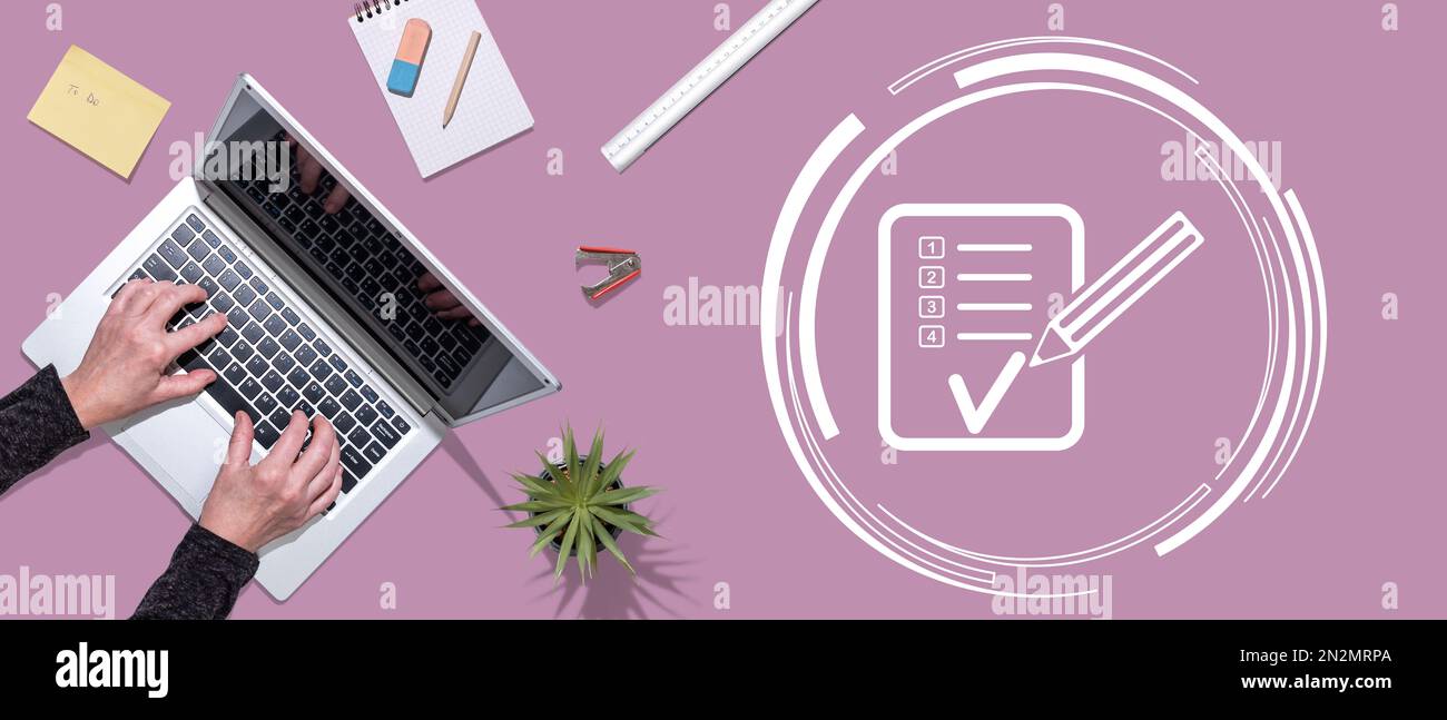 Top view of hands using laptop with symbol of assessment concept Stock ...
